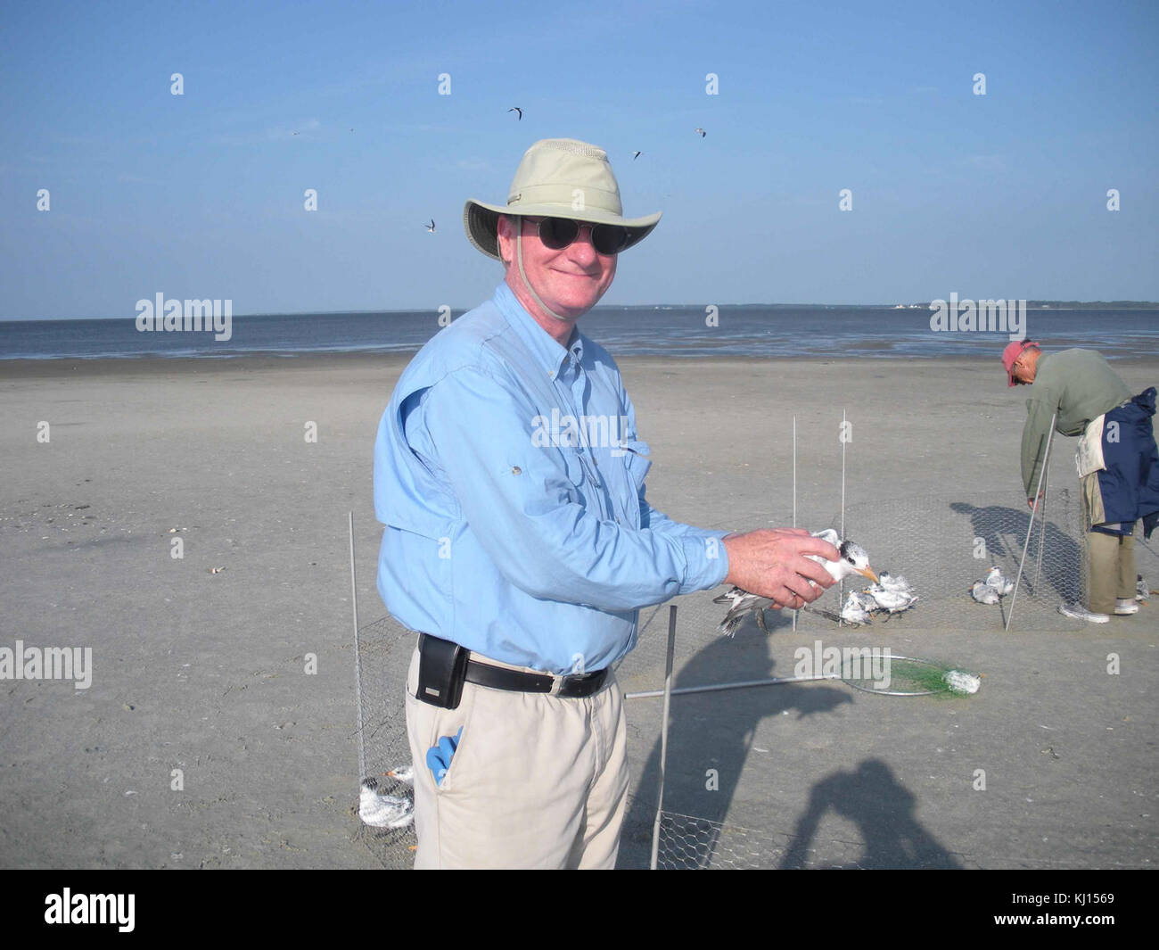 Man bird interaction hi-res stock photography and images - Alamy
