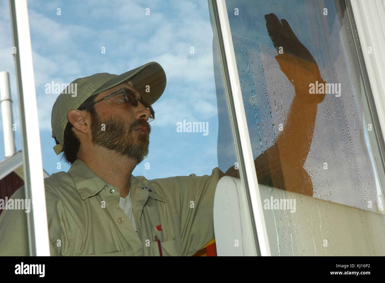 Anti bird strike film application Stock Photo - Alamy