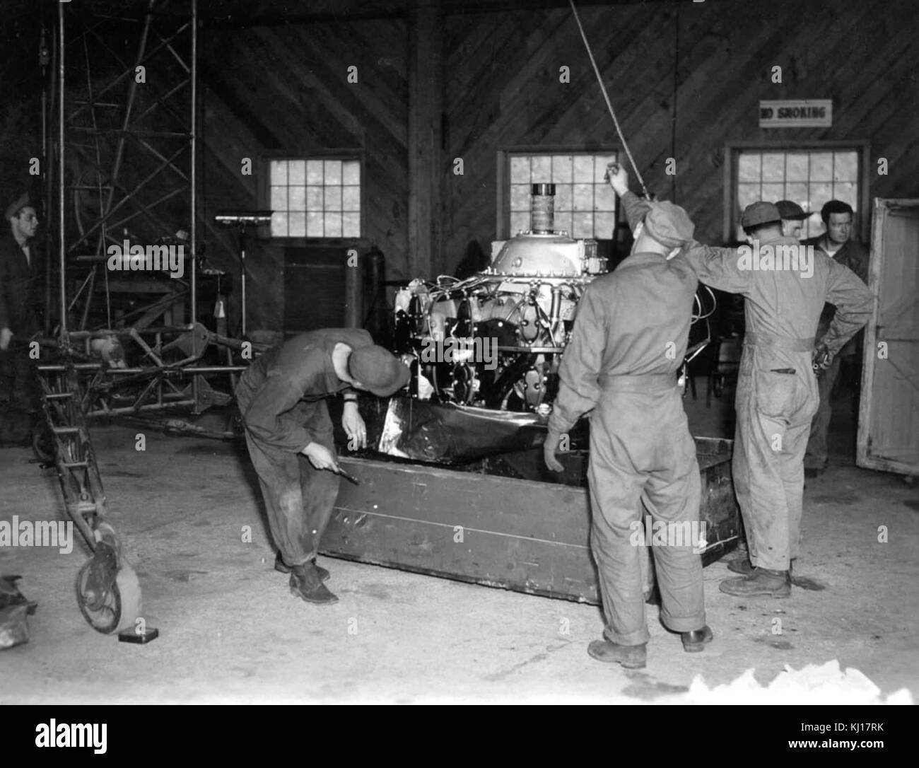 Men employed in the workshop working on the engine turbine Stock Photo ...