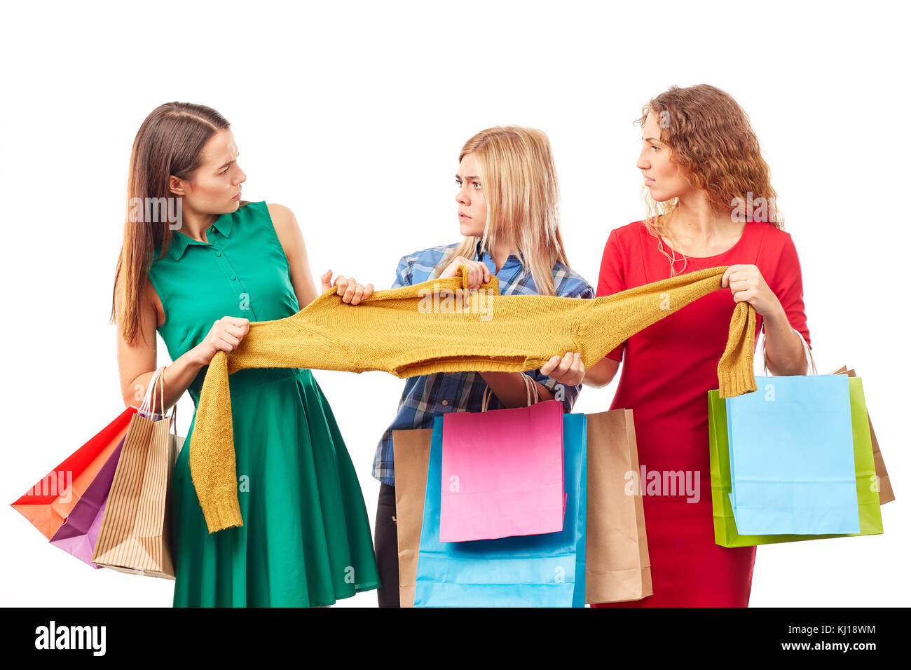 Women fighting over shopping hi-res stock photography and images - Alamy