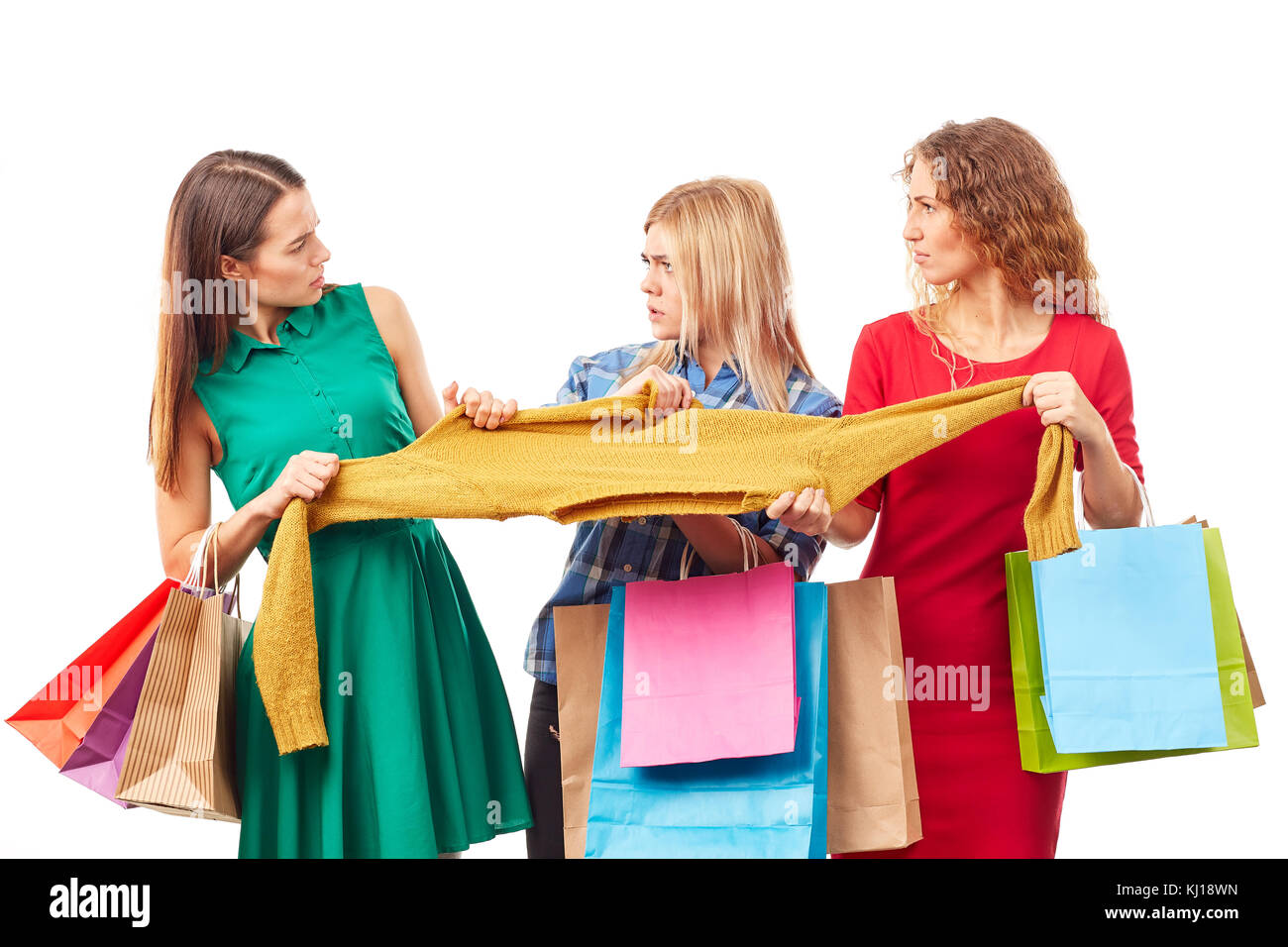 Fighting over piece of clothing Stock Photo - Alamy