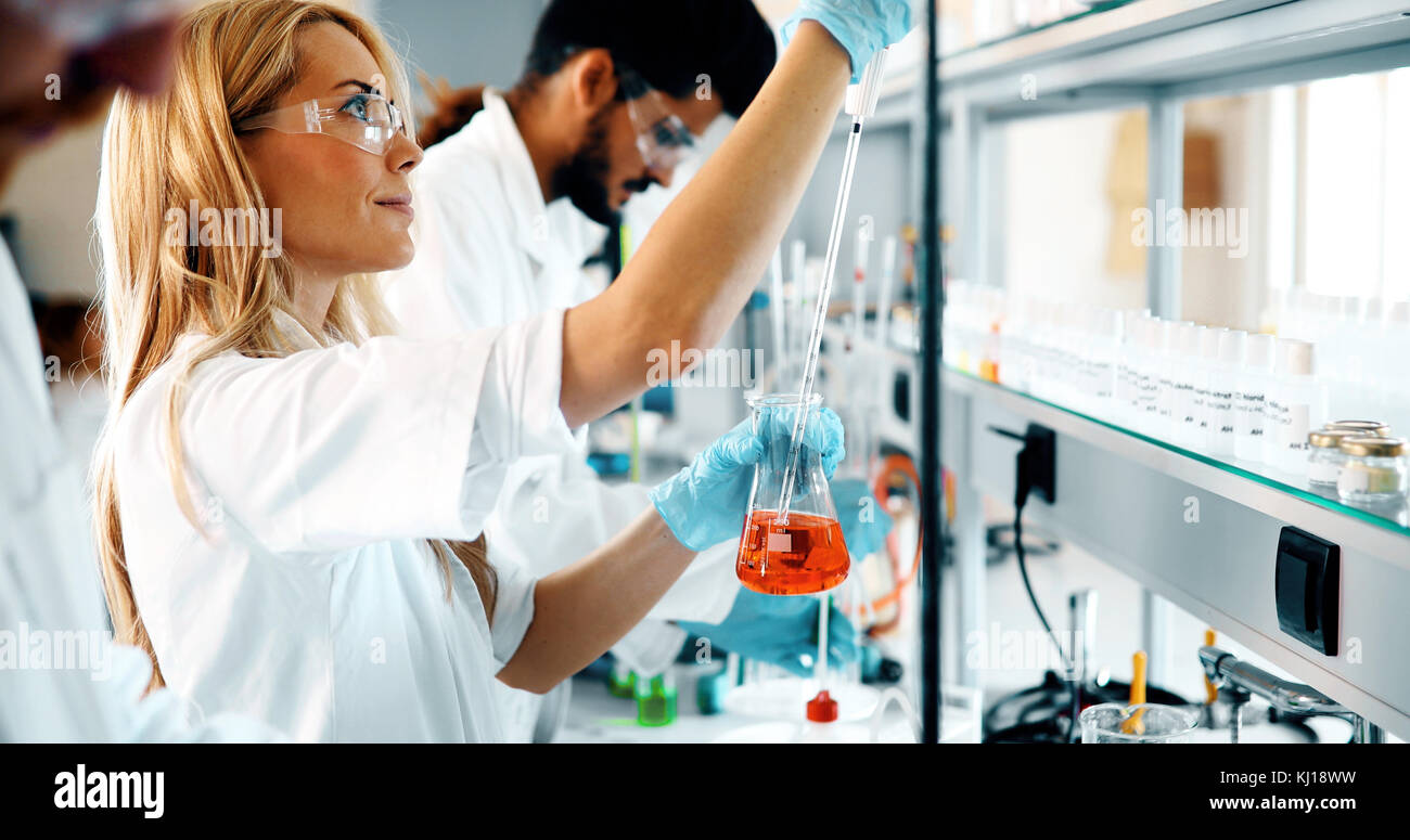 Female student of chemistry working in laboratory Stock Photo - Alamy