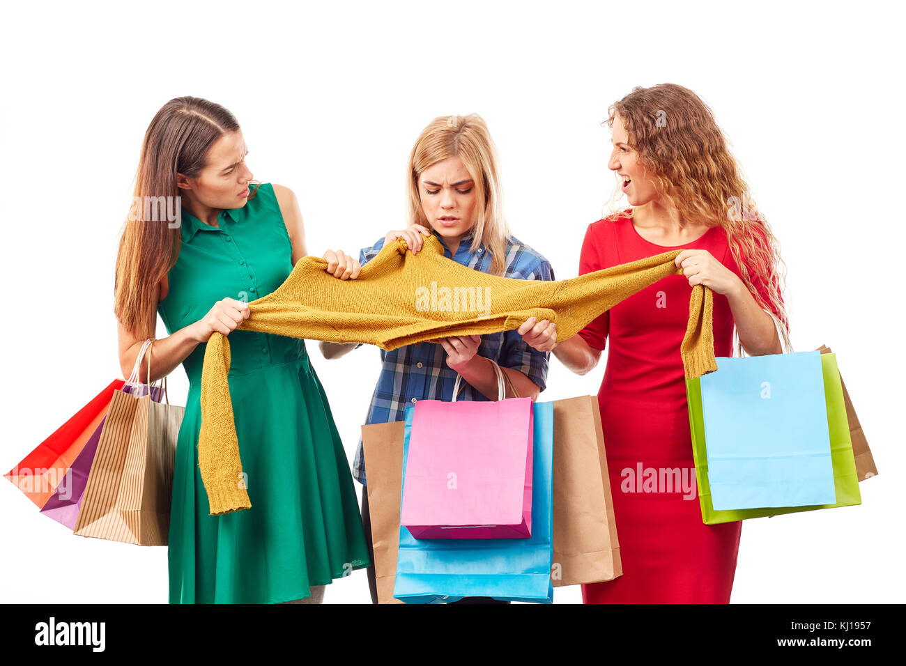 Fighting over piece of clothing Stock Photo - Alamy