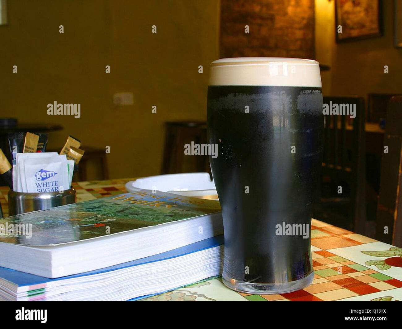 Guinness on table Stock Photo - Alamy