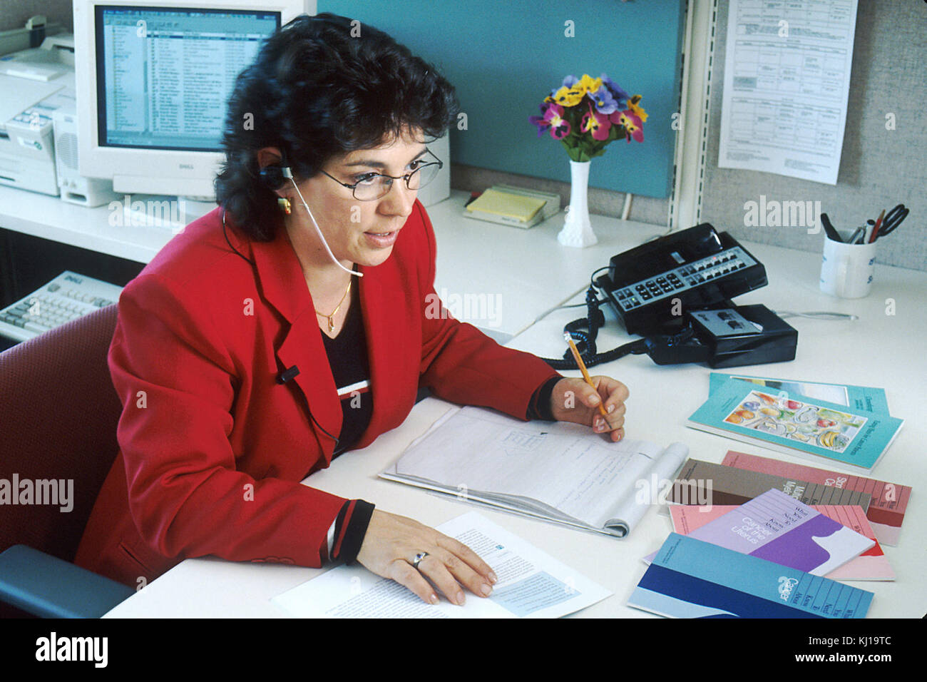 Health professional answers questions Stock Photo - Alamy