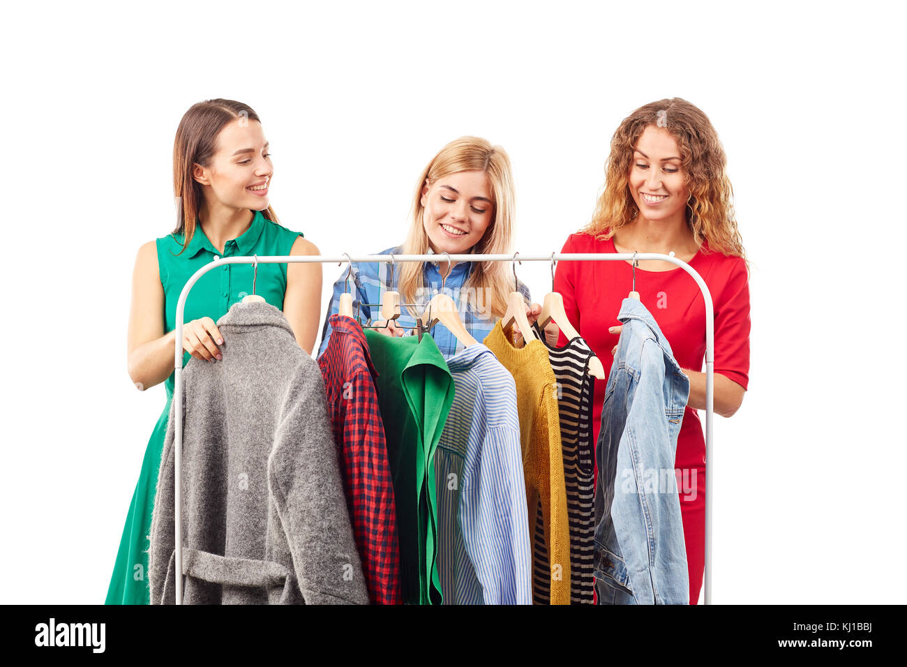 Browsing through clothes Stock Photo - Alamy