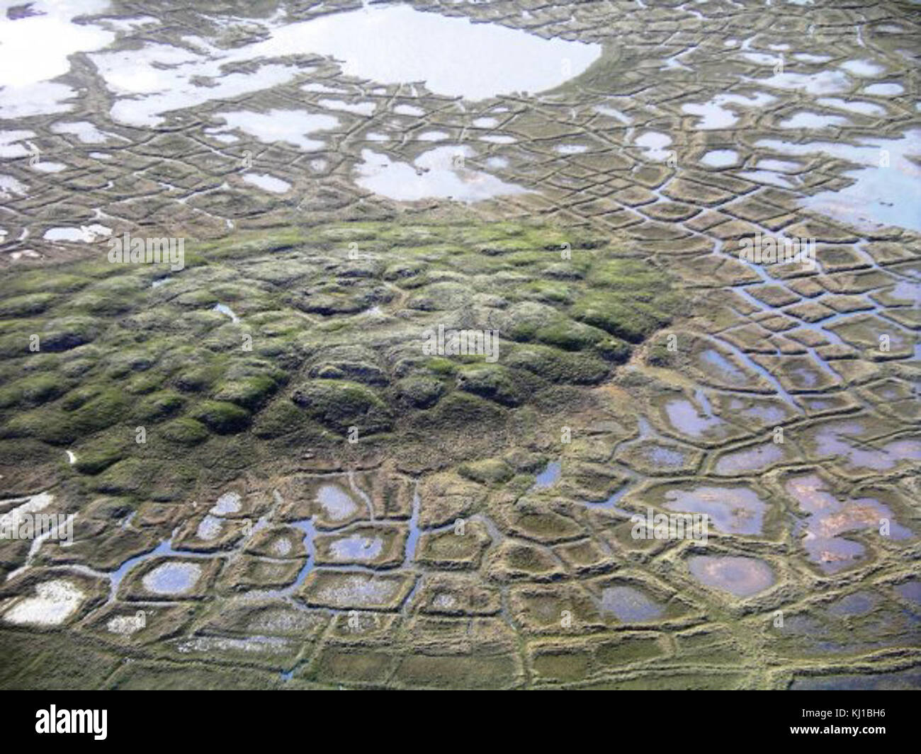 Melting pingo wedge ice Stock Photo - Alamy