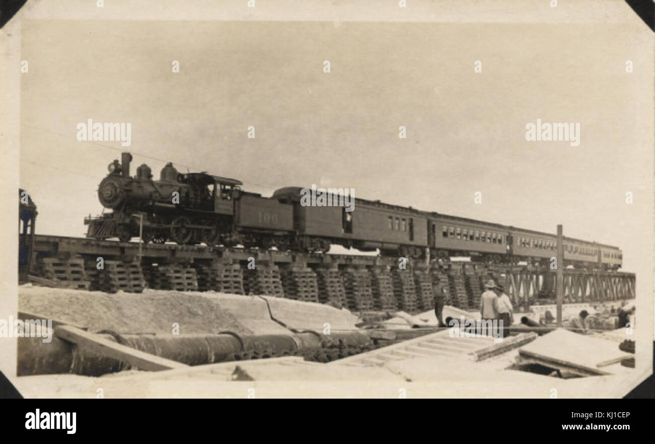 Passenger train crossing the temporary trestle Stock Photo - Alamy