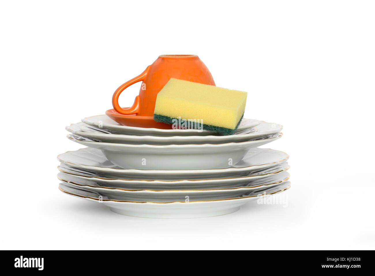 Bath sponge lying on stack of clean plates. Isolated on white with ...