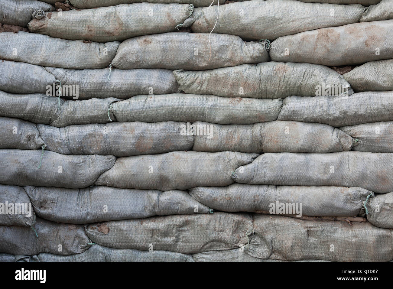 Sandbags for flood protection. Temporary dam Stock Photo - Alamy