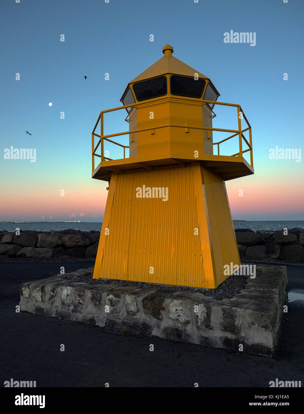 OLYMPUS Icelandic lighthouse at sunrise on the southern shore of Faxa ...
