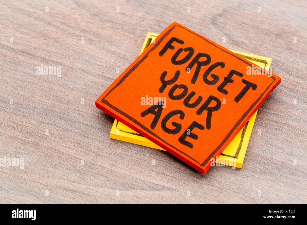 Forget your age advice or reminder - handwriting on a sticky note ...