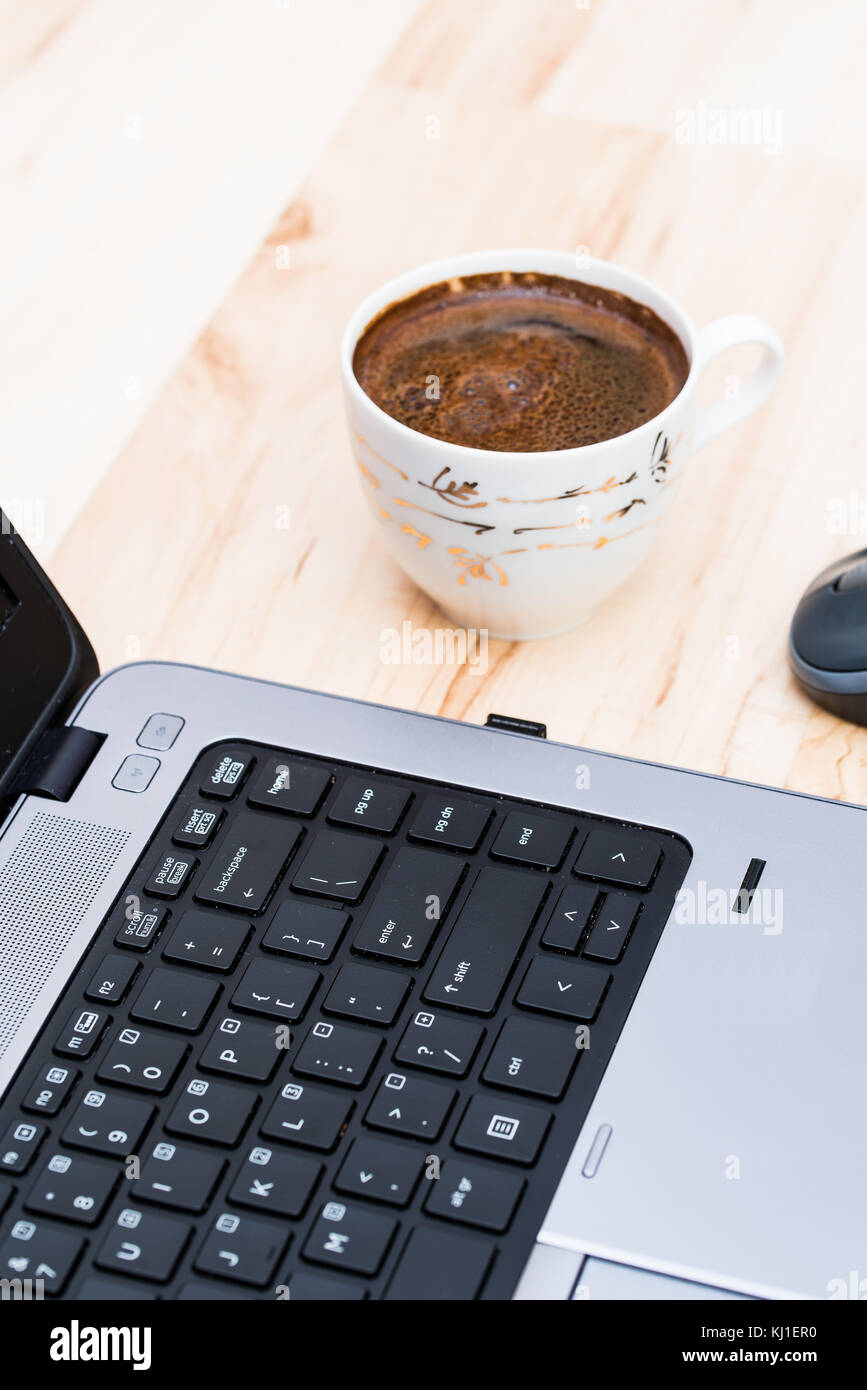 morning coffee, laptop and the mouse on wooden background Stock Photo ...