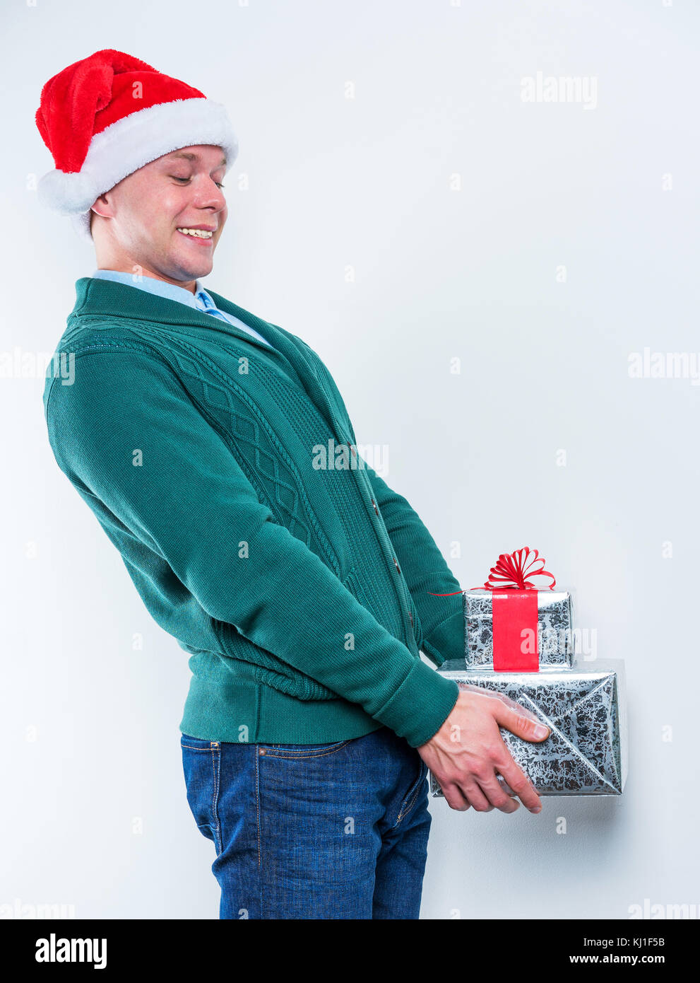 man with Christmas gift box with ribbon Stock Photo - Alamy