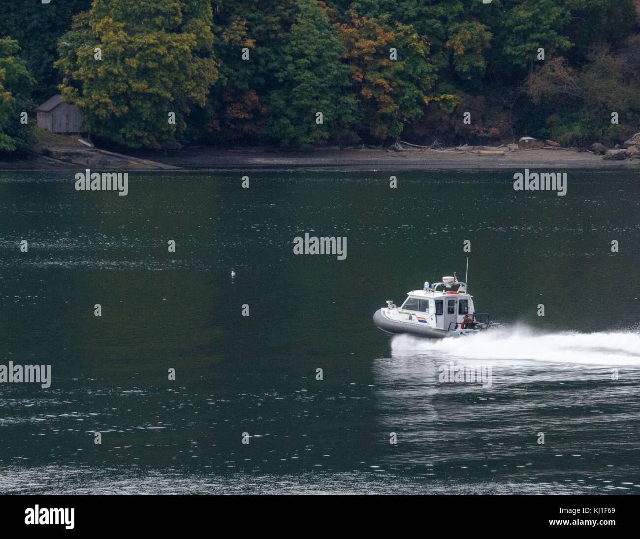 An RCMP patrol boat speeds through the Gulf Islands, B.C., Canada Stock ...