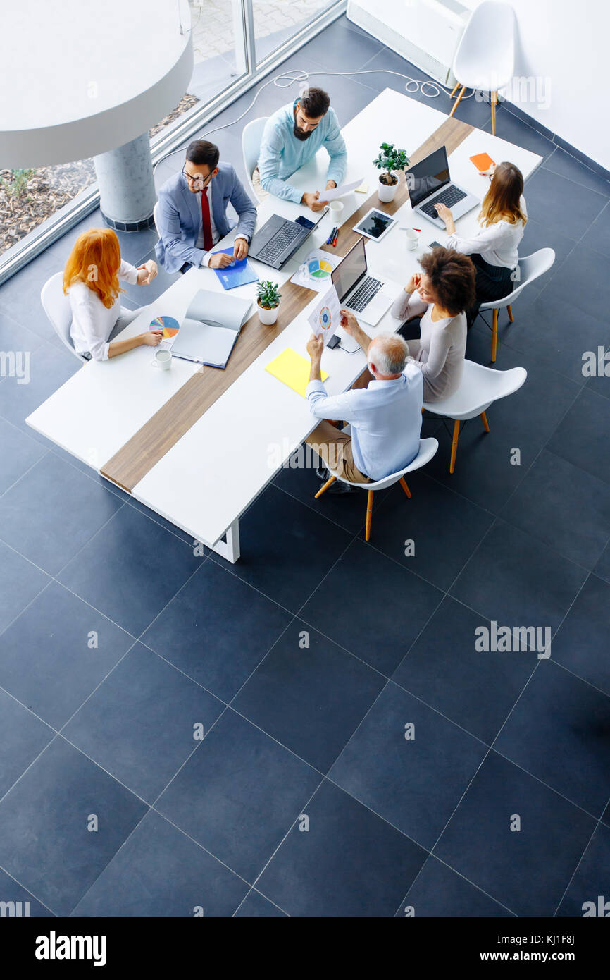 Top view at business people working in office Stock Photo - Alamy