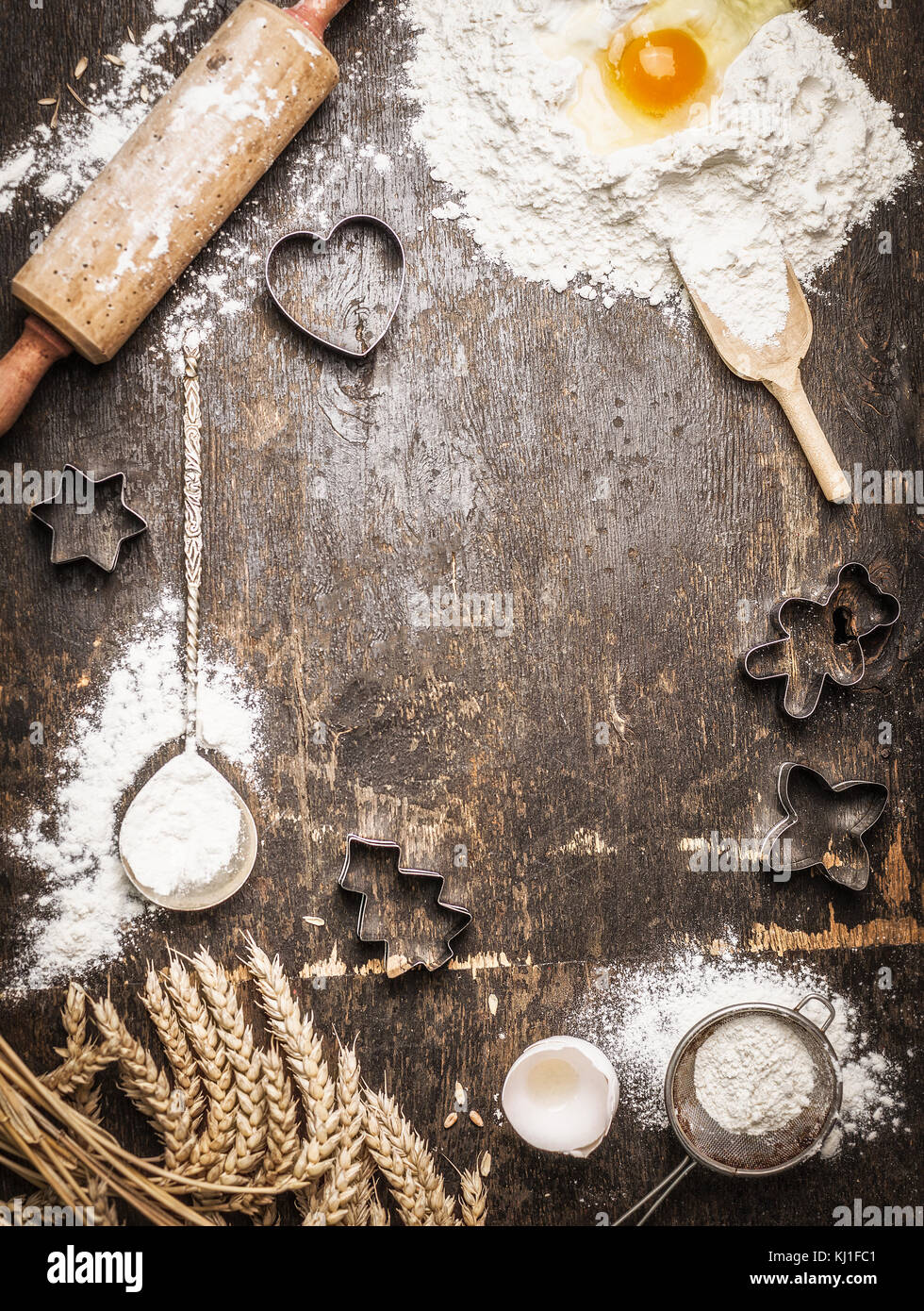 Christmas baking background with ingredients and tools: Cookie Cutters ...