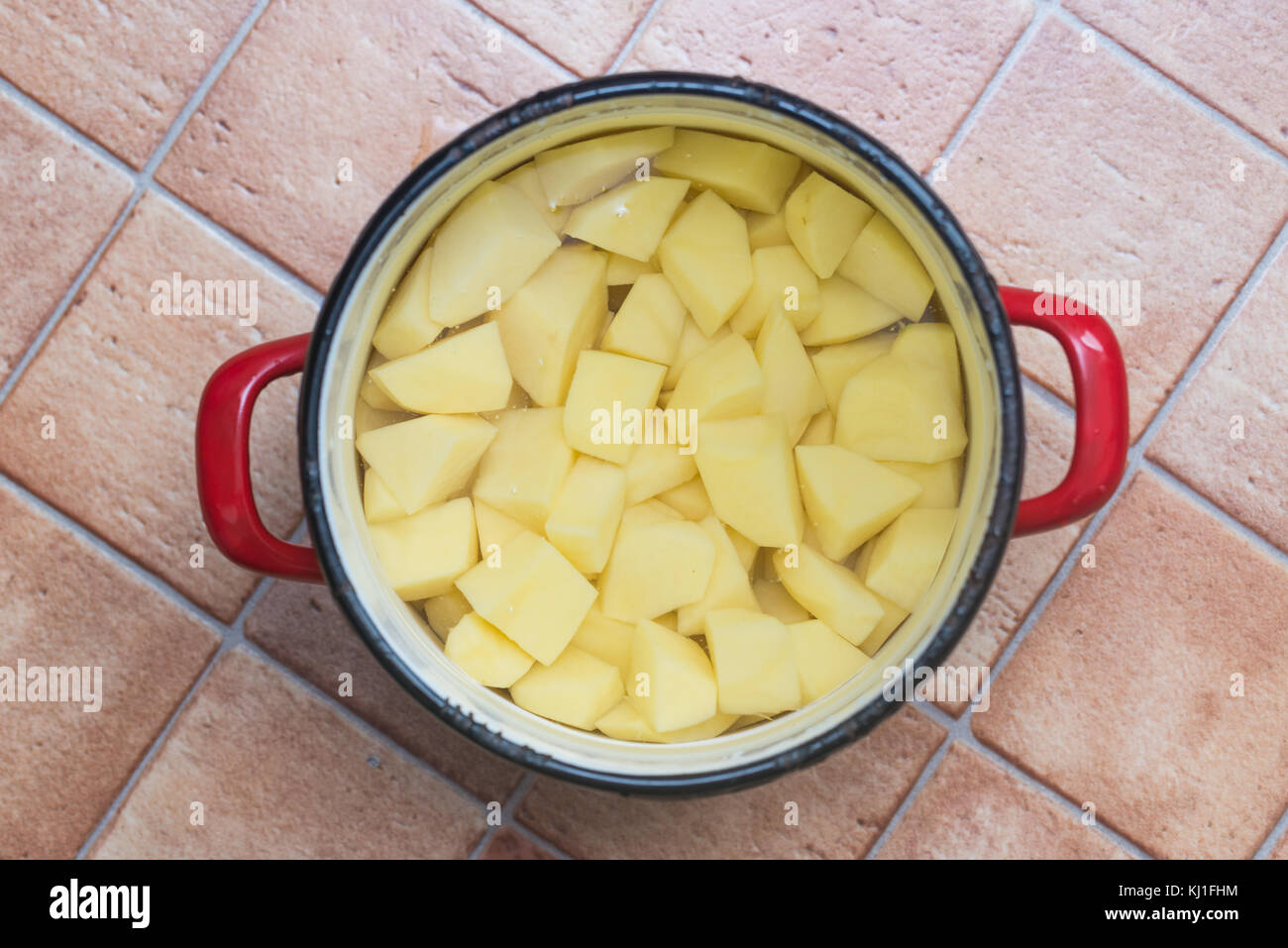 Peeled potatoes cut in hi-res stock photography and images - Alamy