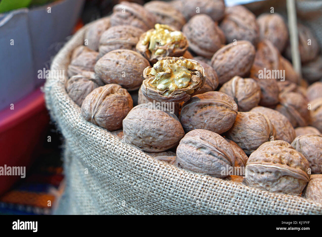 Big bunch of walnuts in sack Stock Photo - Alamy