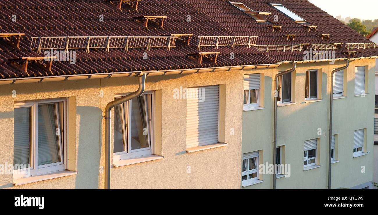 Panorama residential with roof and window in the evening sun in ...