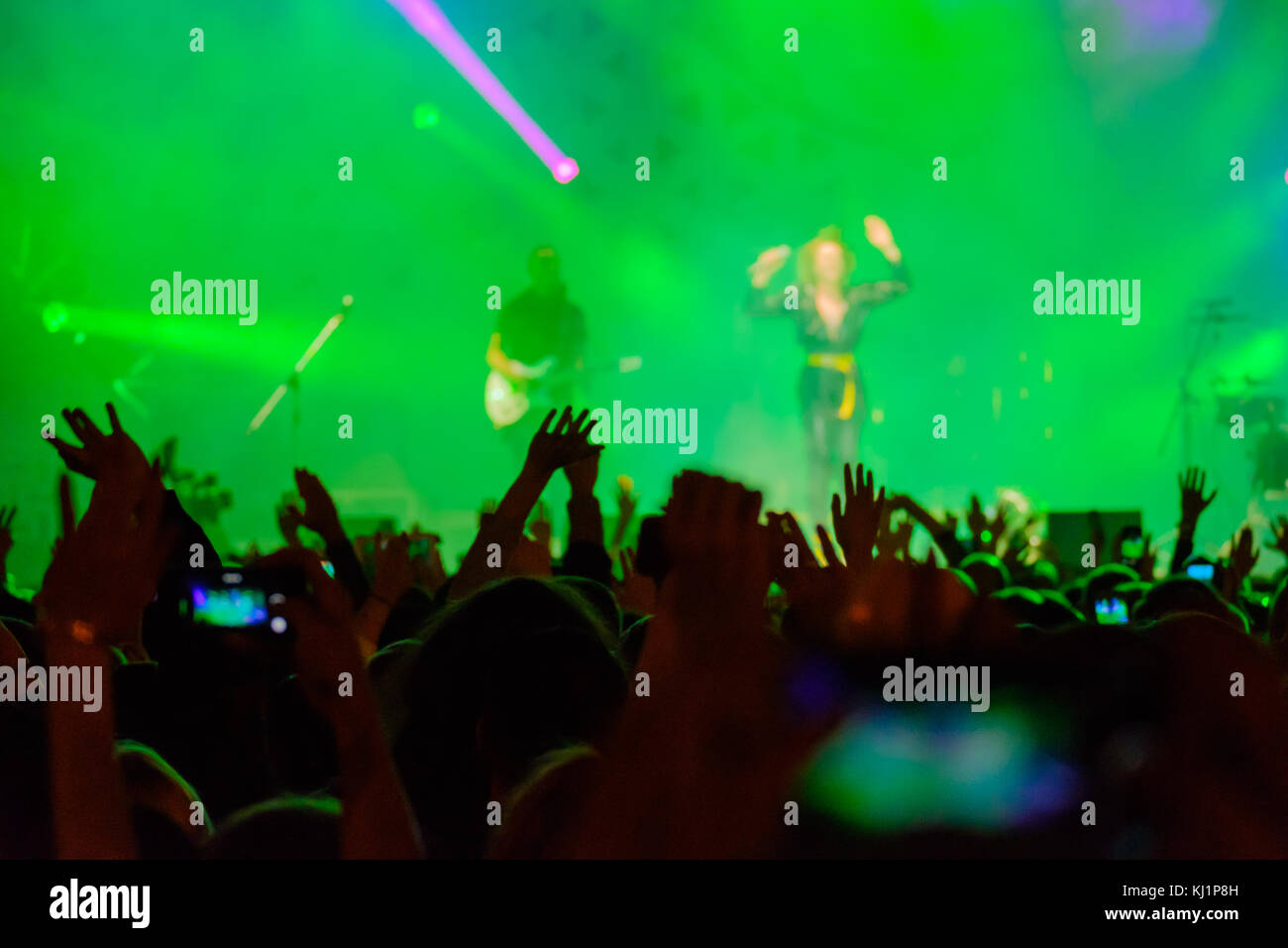 Group performing at live concert Stock Photo - Alamy