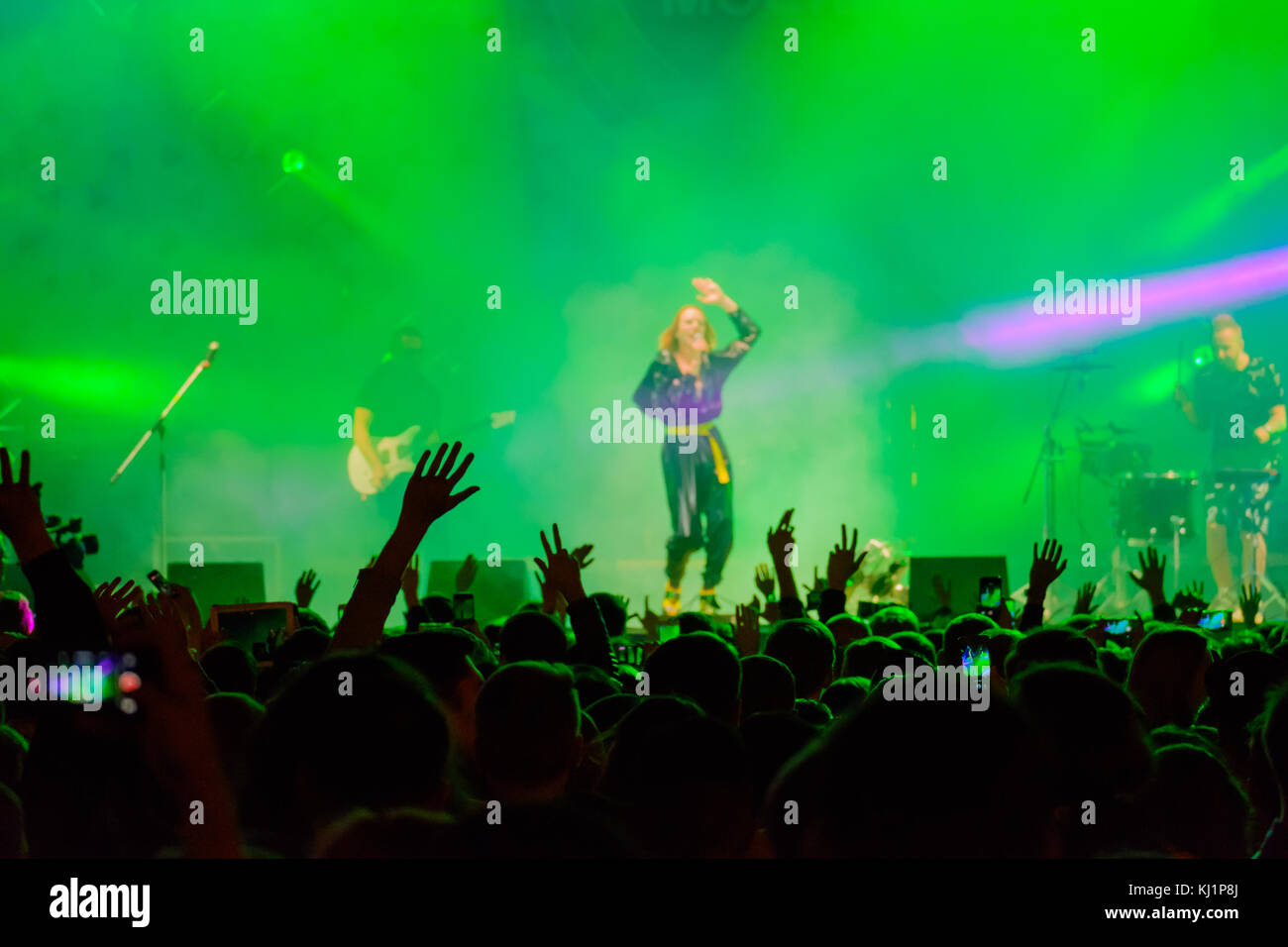 Group performing at live concert Stock Photo - Alamy