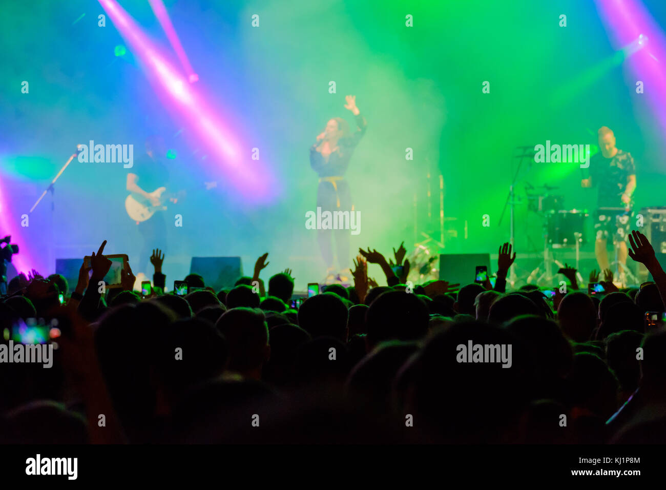 Group performing at live concert Stock Photo - Alamy