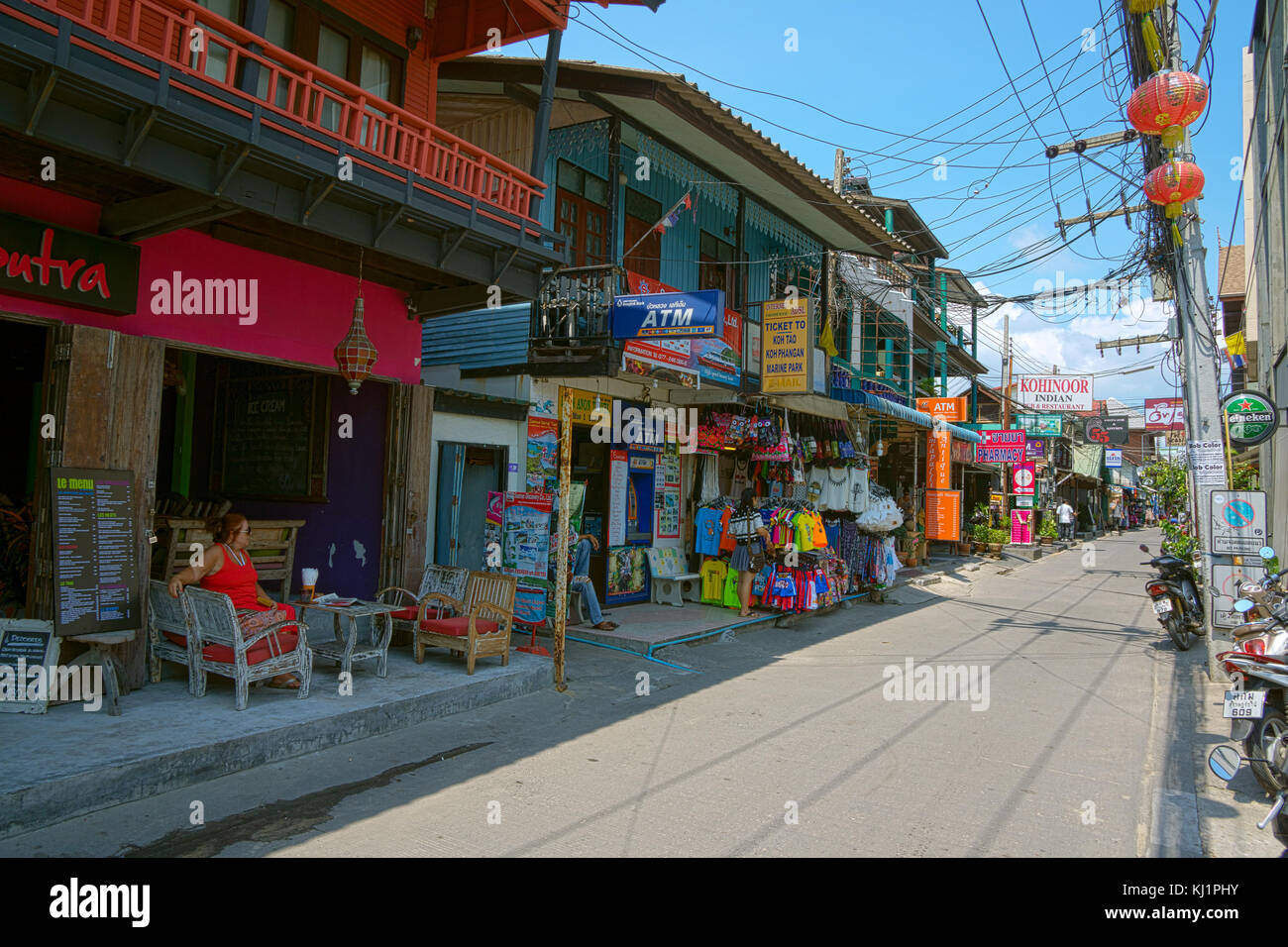 Typical street with many shops and cafes for tourists at day time Stock ...