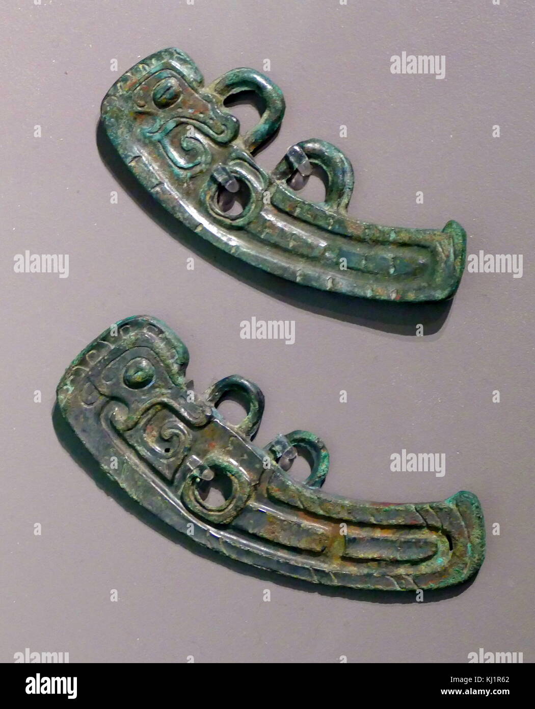 Set of cheek pieces Bronze, Zhou dynasty (c.1050-221 BC). These cheek ...