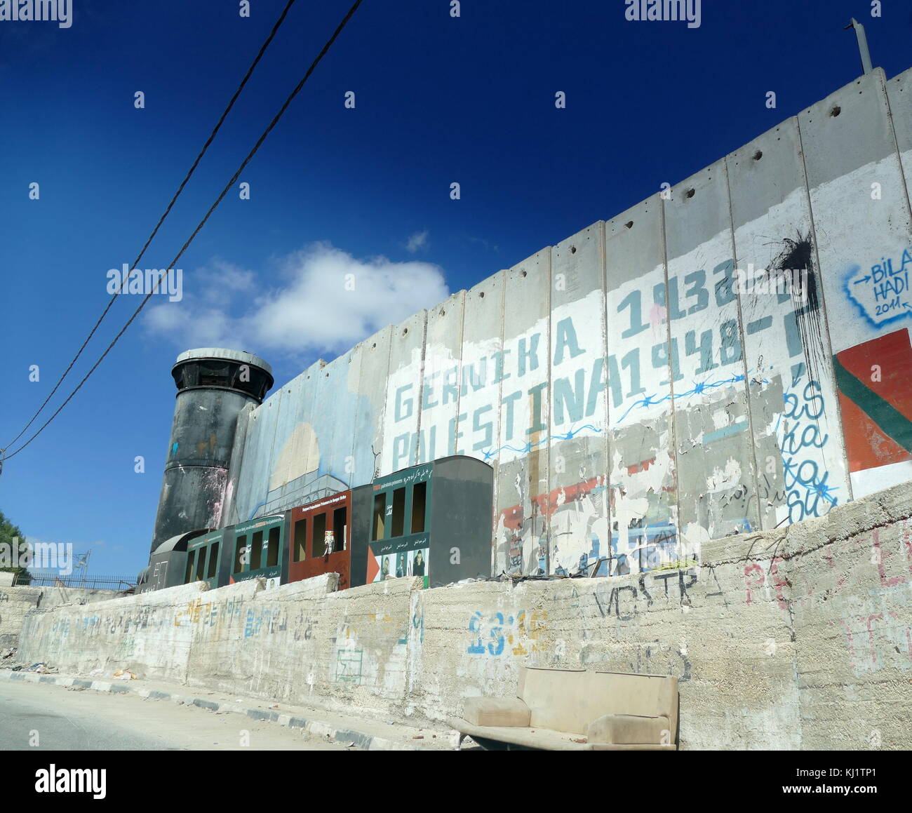 Guard tower at the entrance to a walled refugee camp in the Palestinian ...