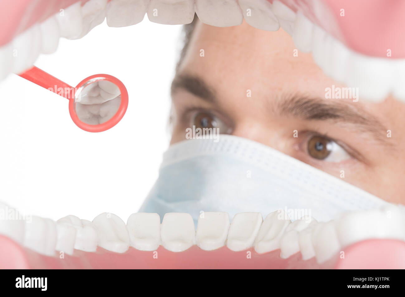 Dentist inspecting teeth inside a mouth Stock Photo - Alamy