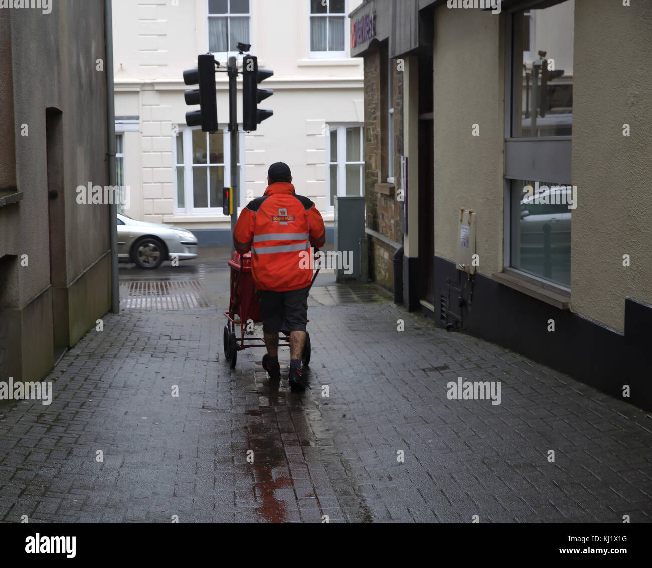 Postman in shorts hi-res stock photography and images - Alamy