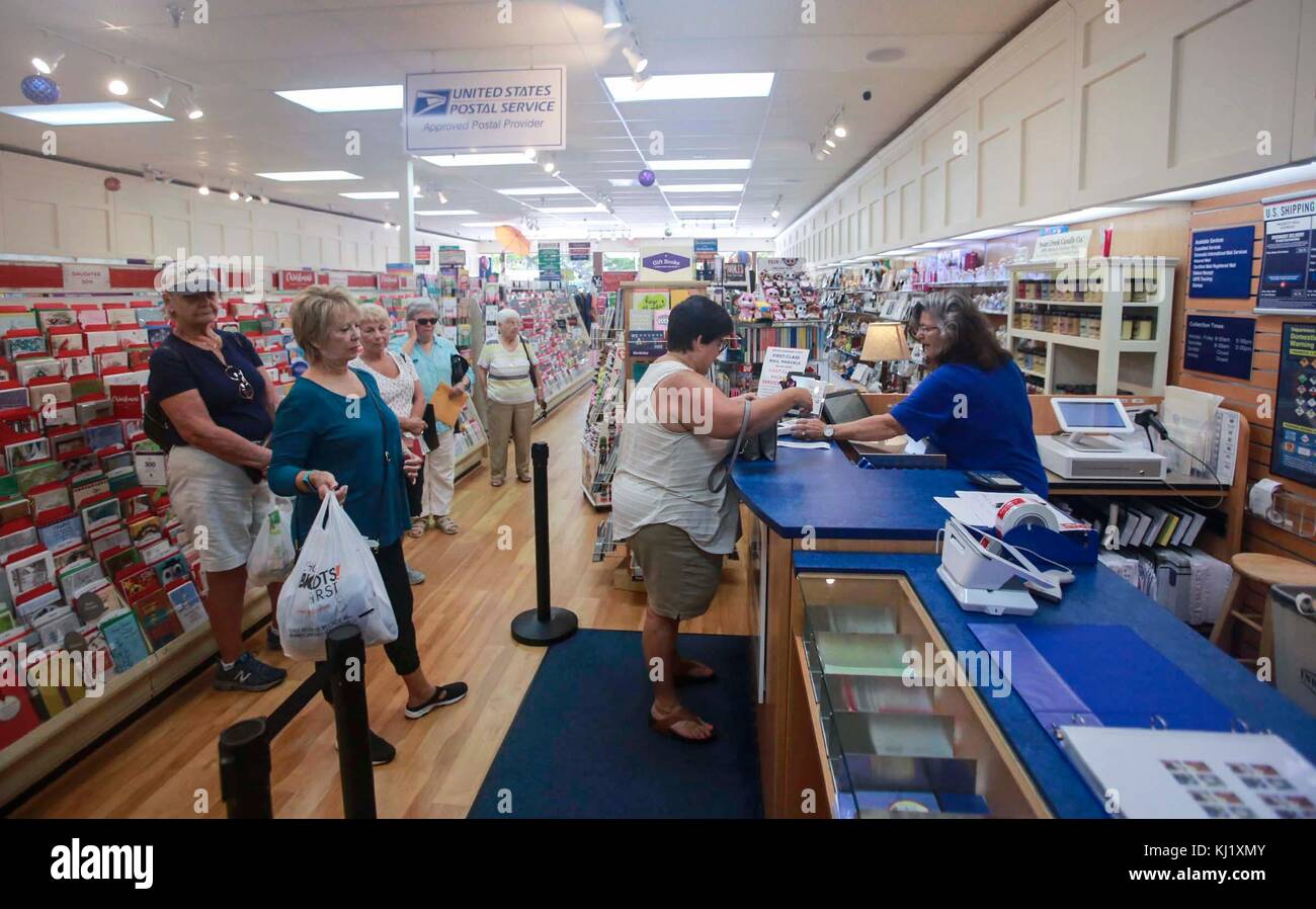 Postal clerk hi-res stock photography and images - Alamy
