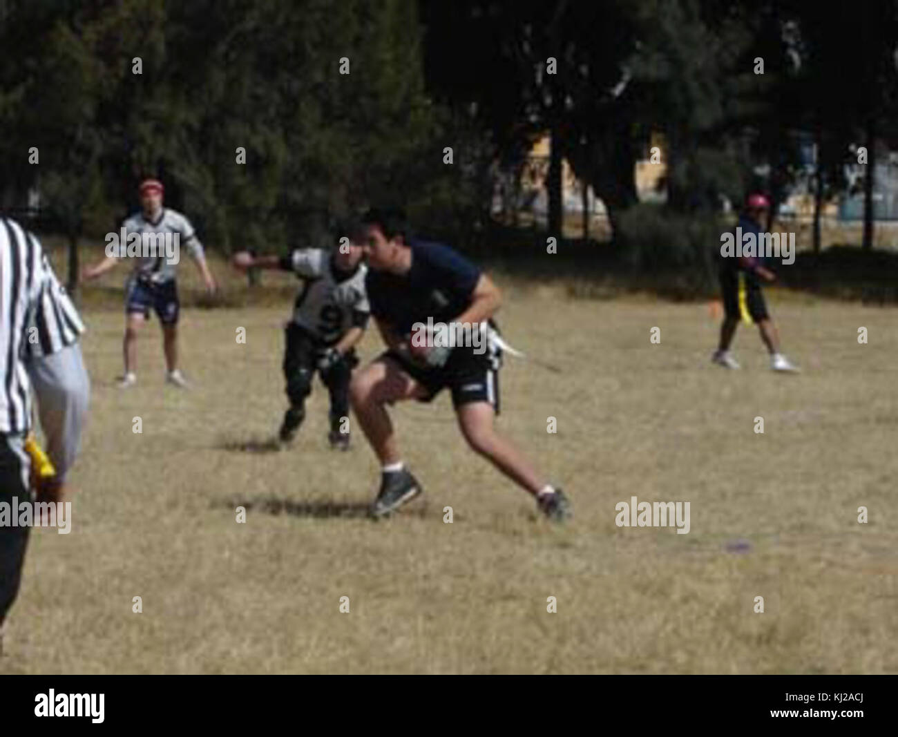 People playing flag football Stock Photo - Alamy