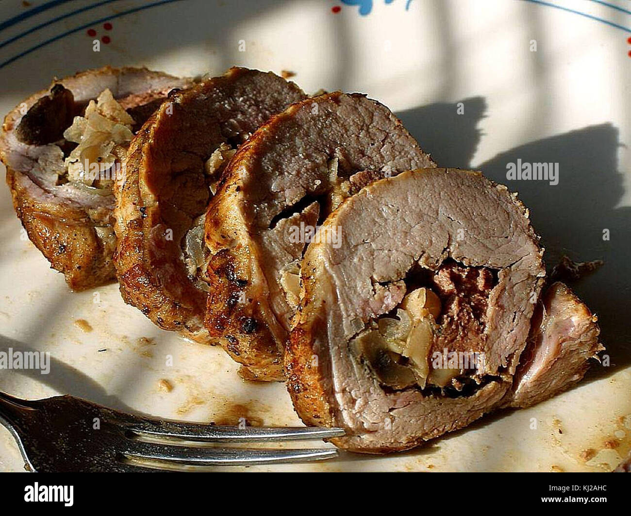 Pork loin stuffed Stock Photo - Alamy