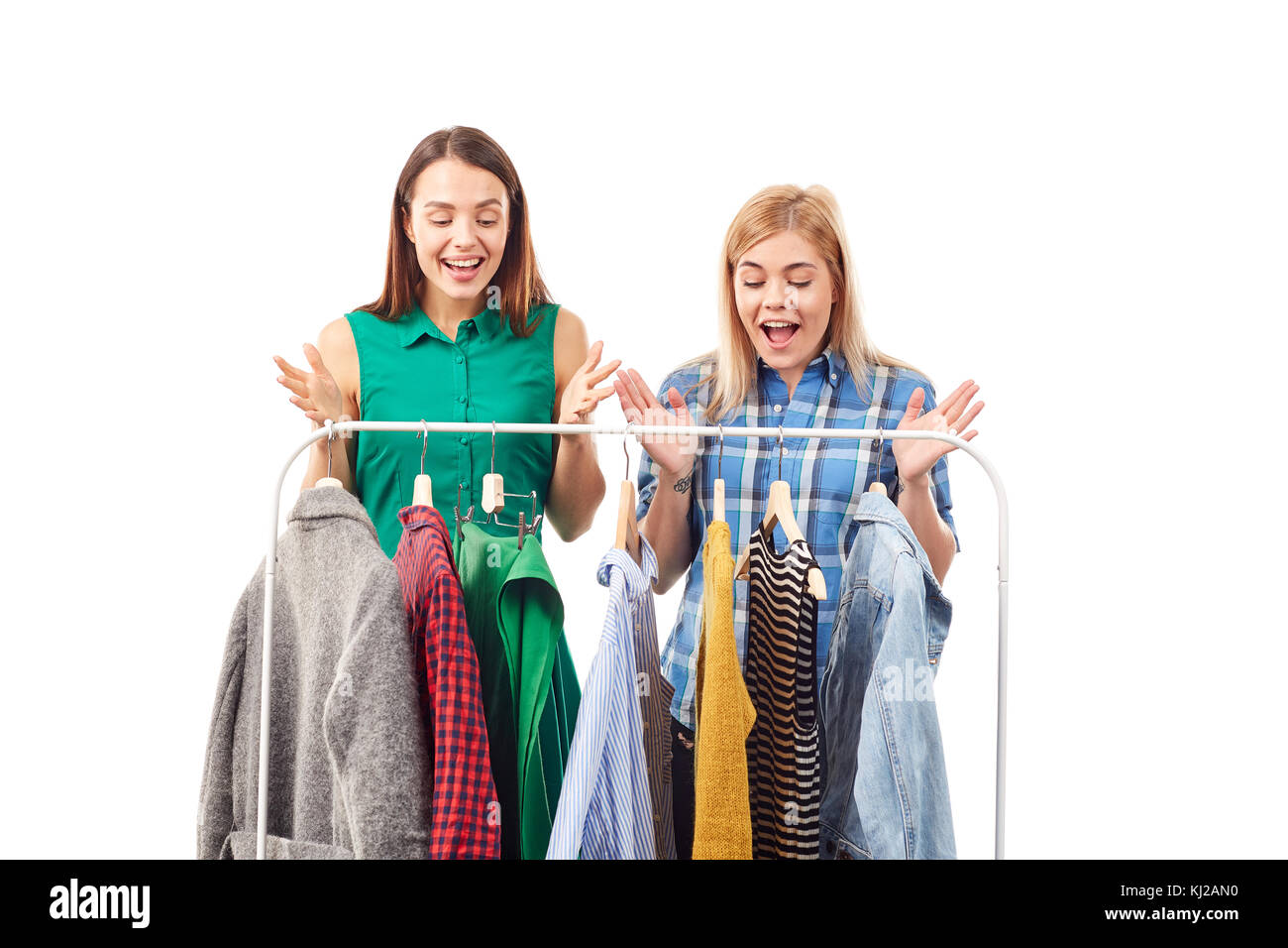 Beautiful women choosing clothes hi-res stock photography and images - Alamy