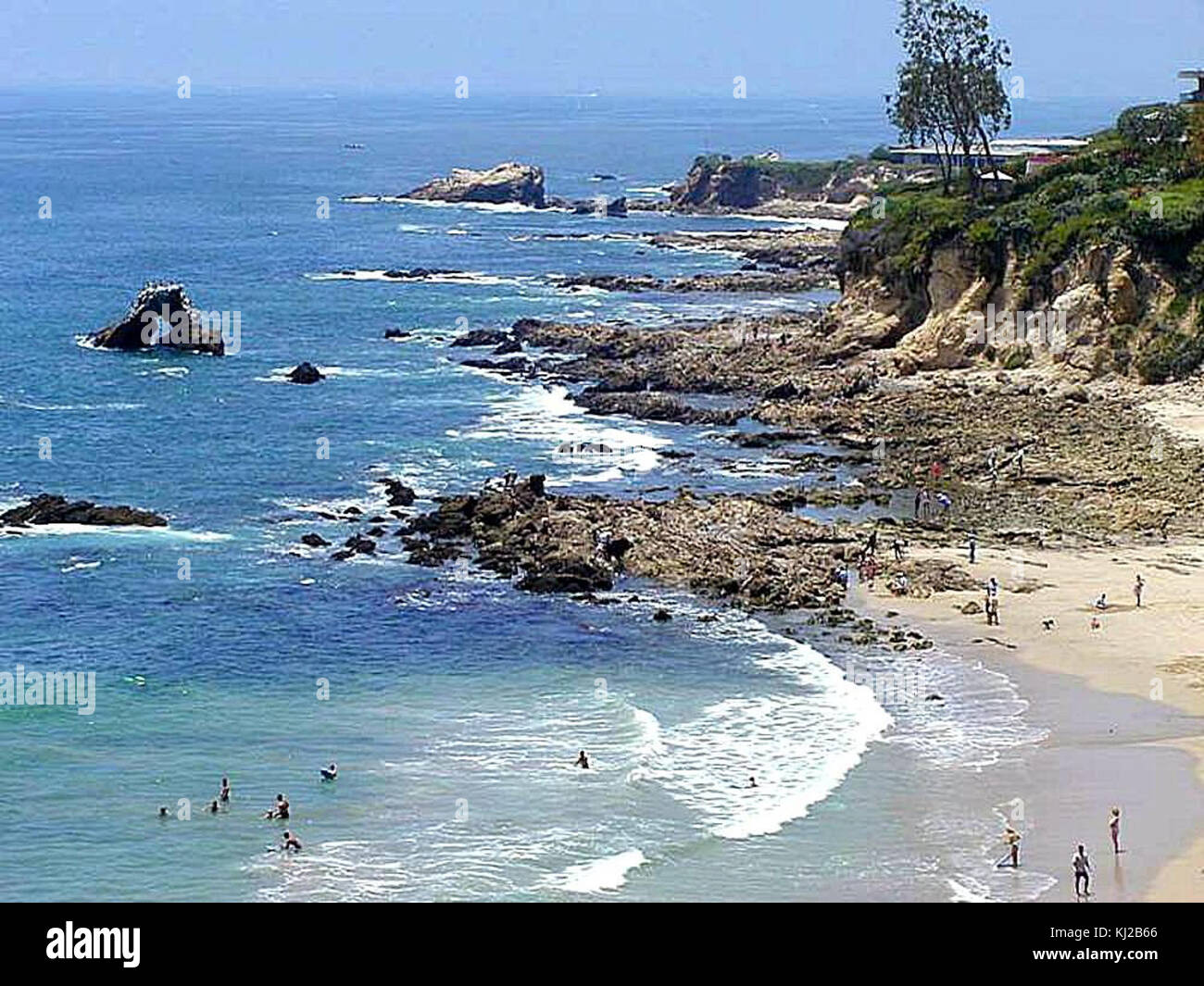 Sand ocean tidepools sea swimming swimmers waves Stock Photo - Alamy