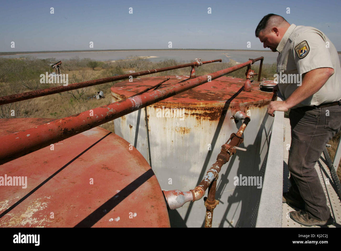 Old rusty oil tanks Stock Photo - Alamy