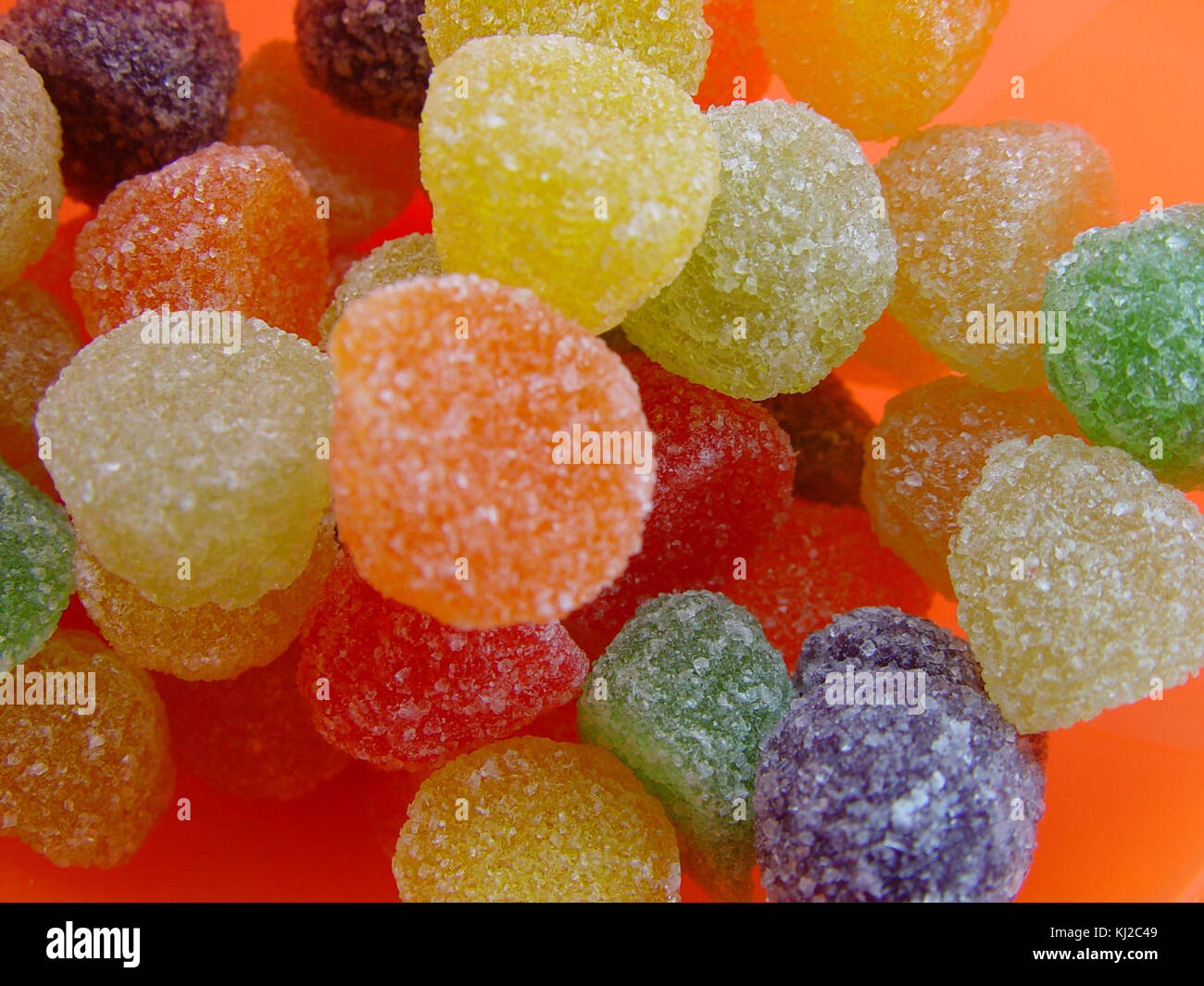 Sugared jubes in orange bowl Stock Photo - Alamy