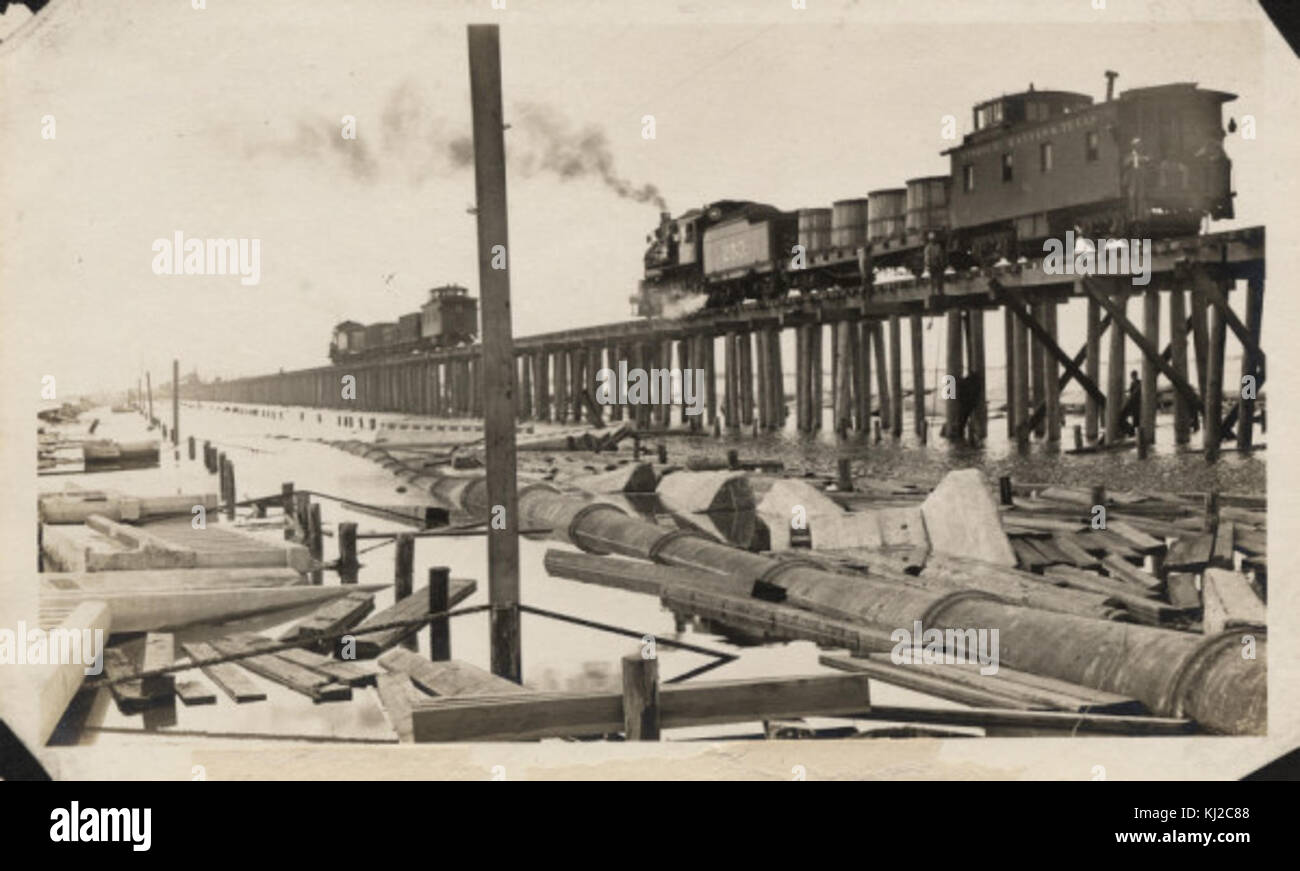 Three trains crossing the temporary trestle Stock Photo - Alamy