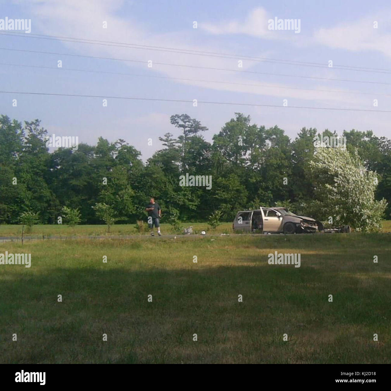 Wrecked van that hit a tree Stock Photo - Alamy