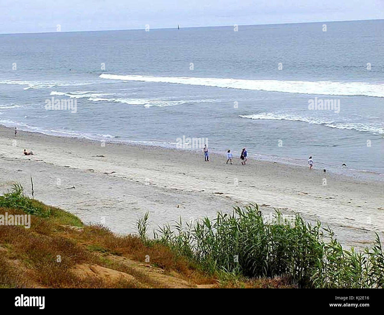 This image captures the natural beauty of a beach scene, with ocean ...