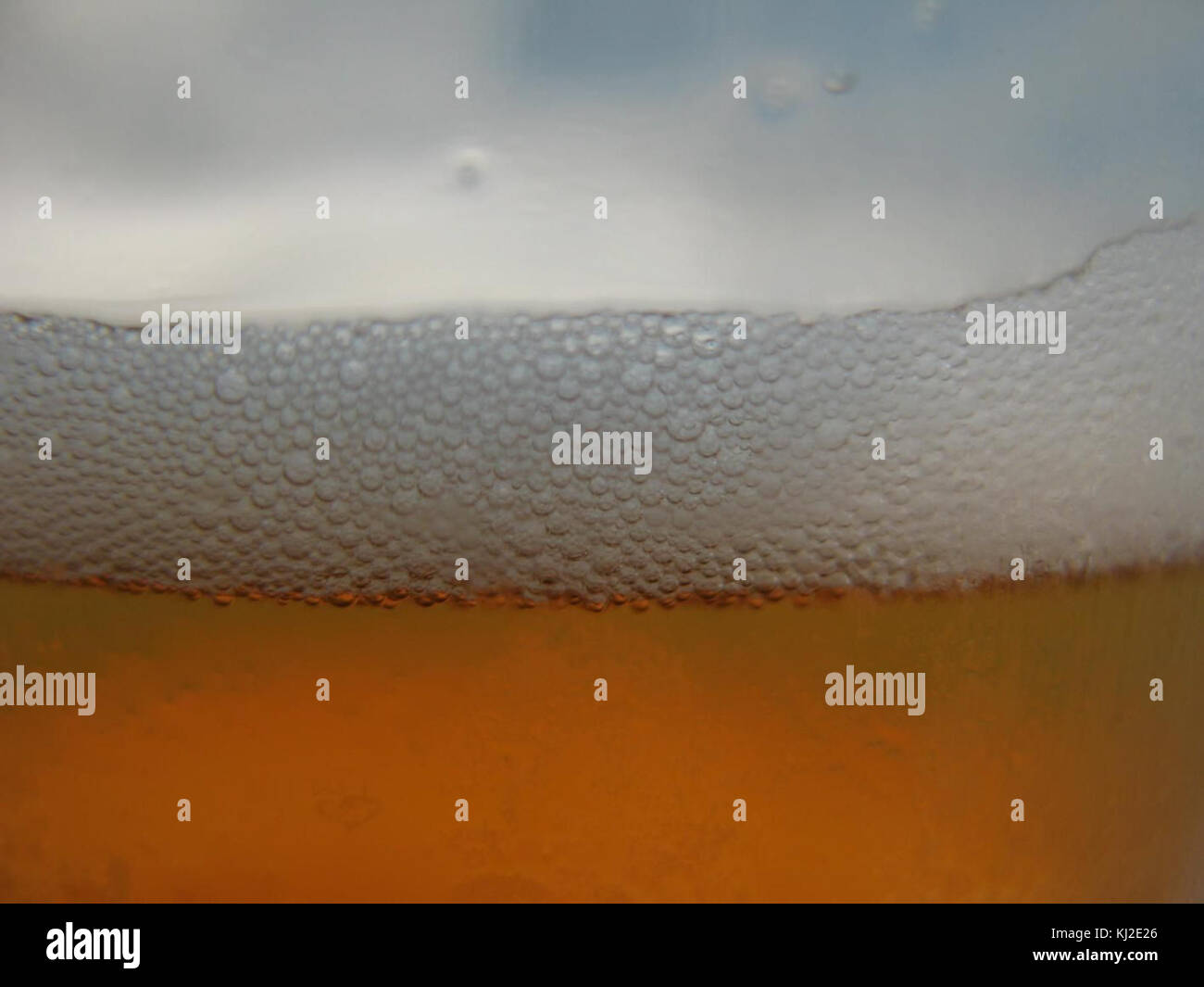 Beer in glass close up Stock Photo - Alamy