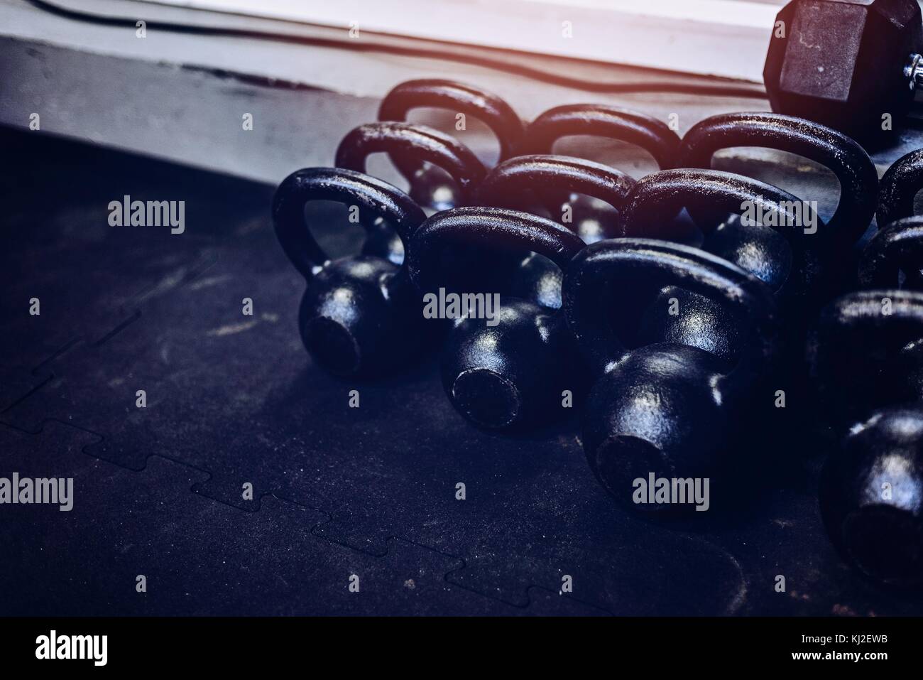 Metal heavy kettlebells weights in the gym. Crossfit workout of the day ...