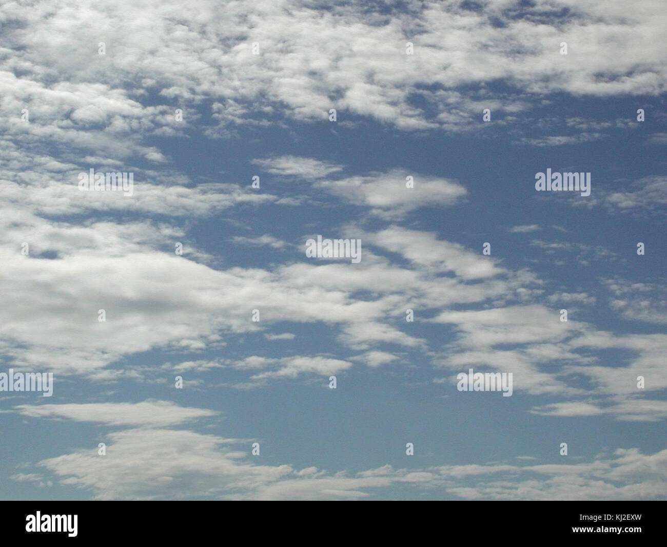 This image captures the dynamic beauty of clouds, showcasing different ...