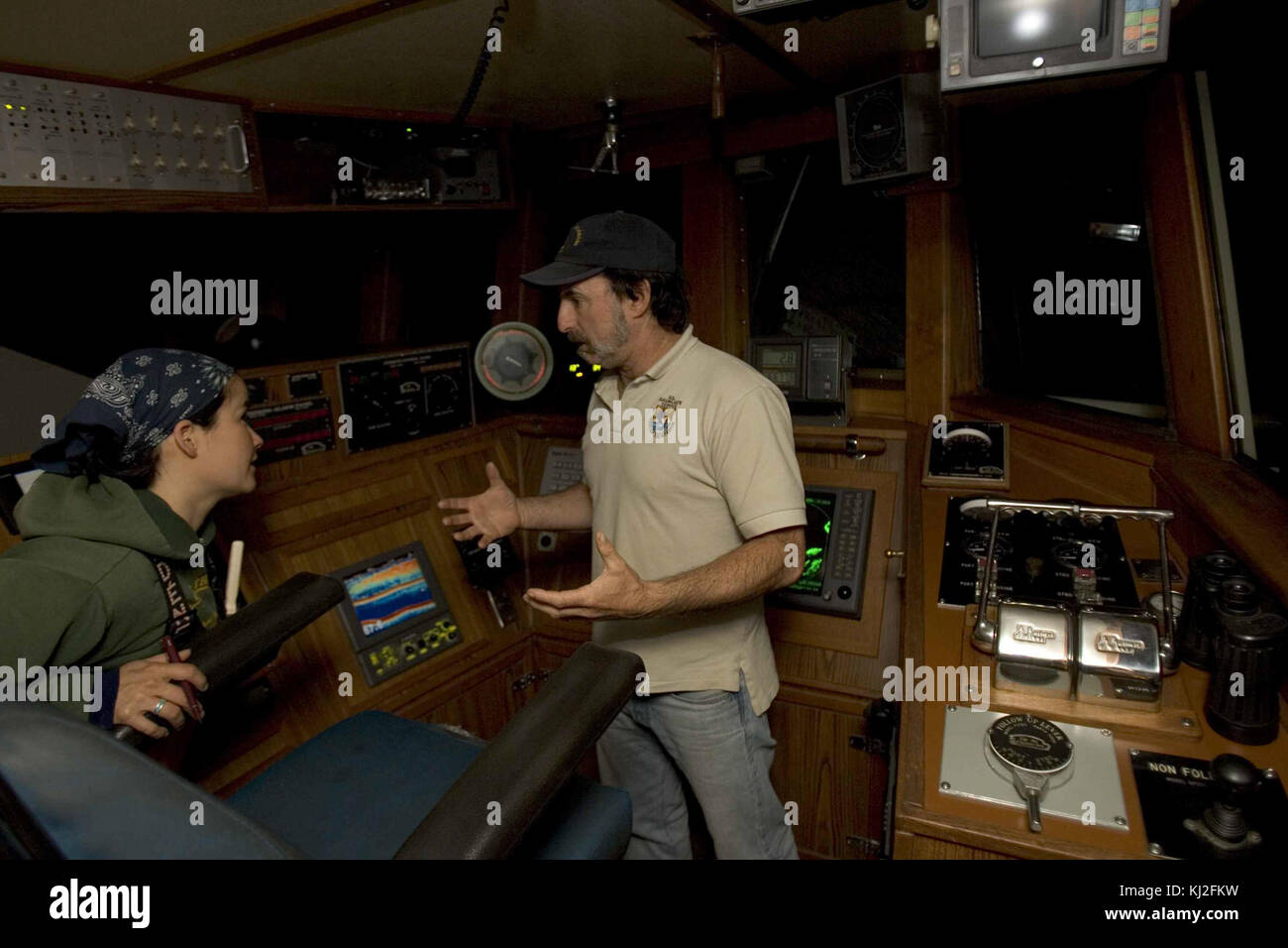 People on ship talking Stock Photo - Alamy