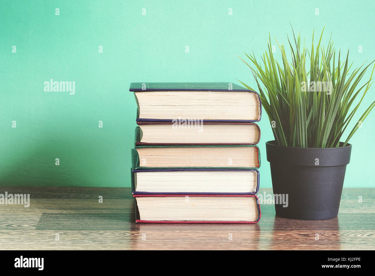 Education books and other objects on the table Stock Photo - Alamy