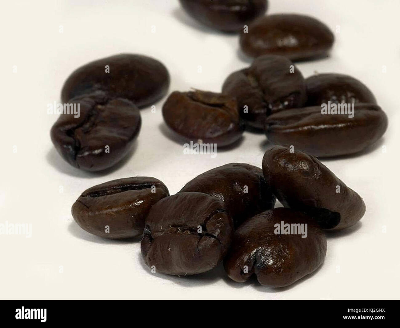 Dark roasted coffee beans Stock Photo - Alamy