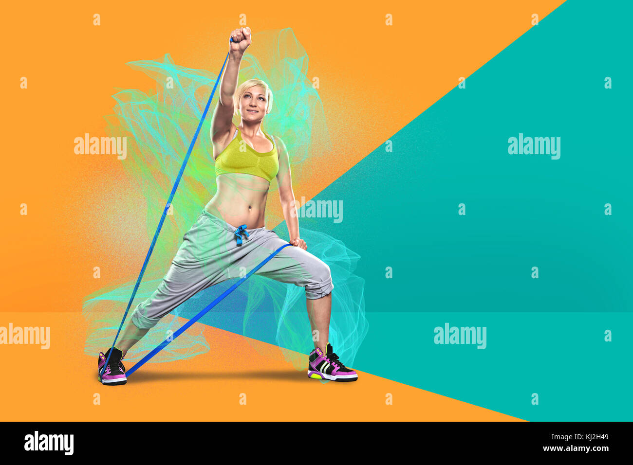 young woman exercising with elastic expander Stock Photo - Alamy