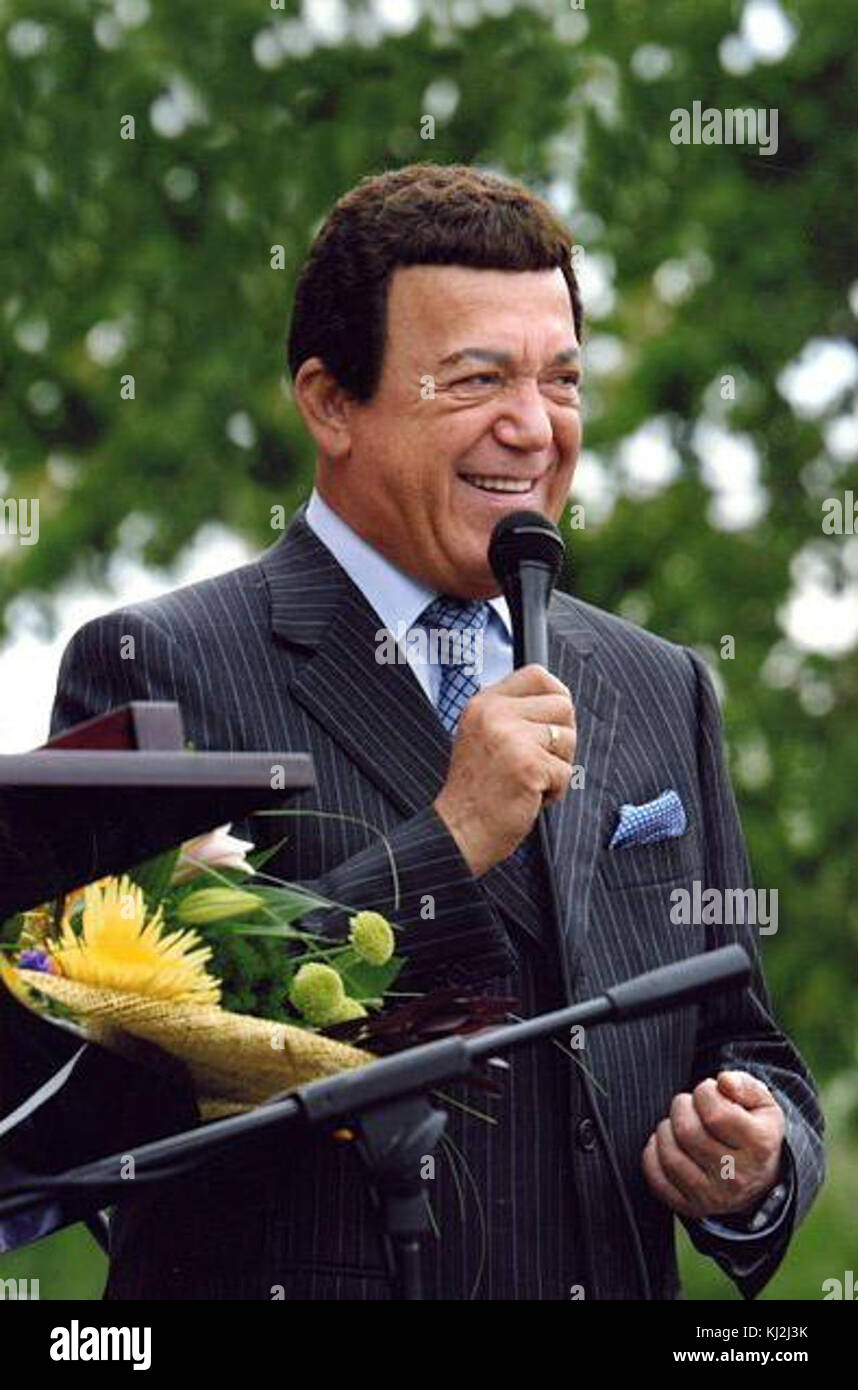 Kobzon with mic Stock Photo - Alamy